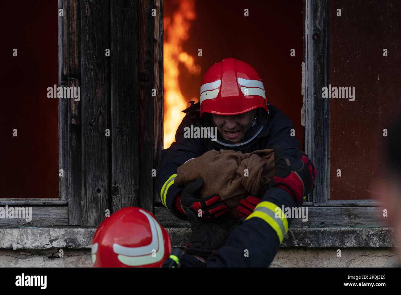 Firefighter Carrying Child