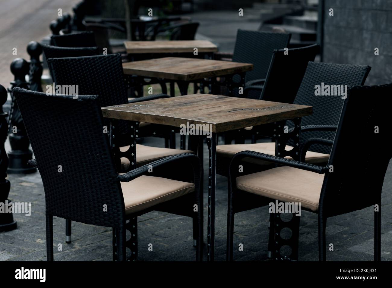 cozy outdoor cafe with tables and chairs. street restaurant Stock Photo ...