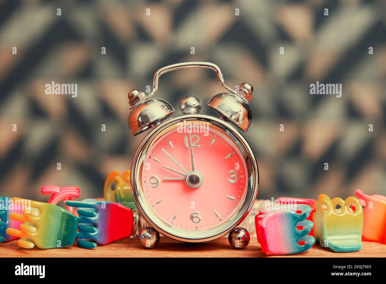 Small vintage alarm clock with timer and girls accessories. Sleep and ...