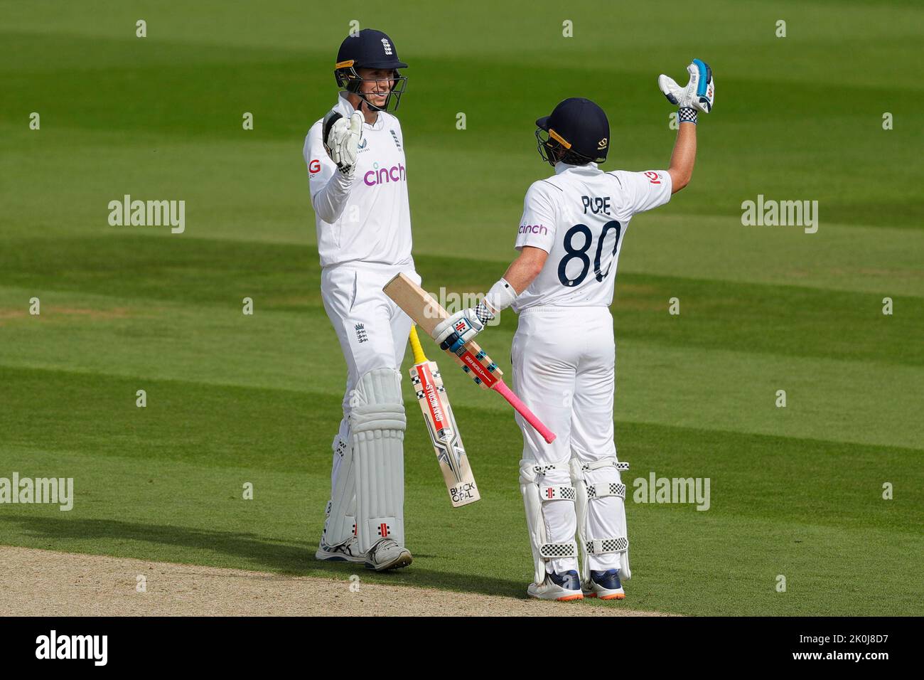 England's Ollie Pope and Zak Crawley celebrate winning during the Third ...