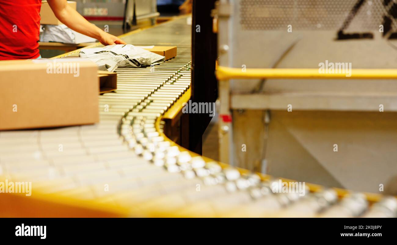 Carton on roller conveyor hi-res stock photography and images - Alamy