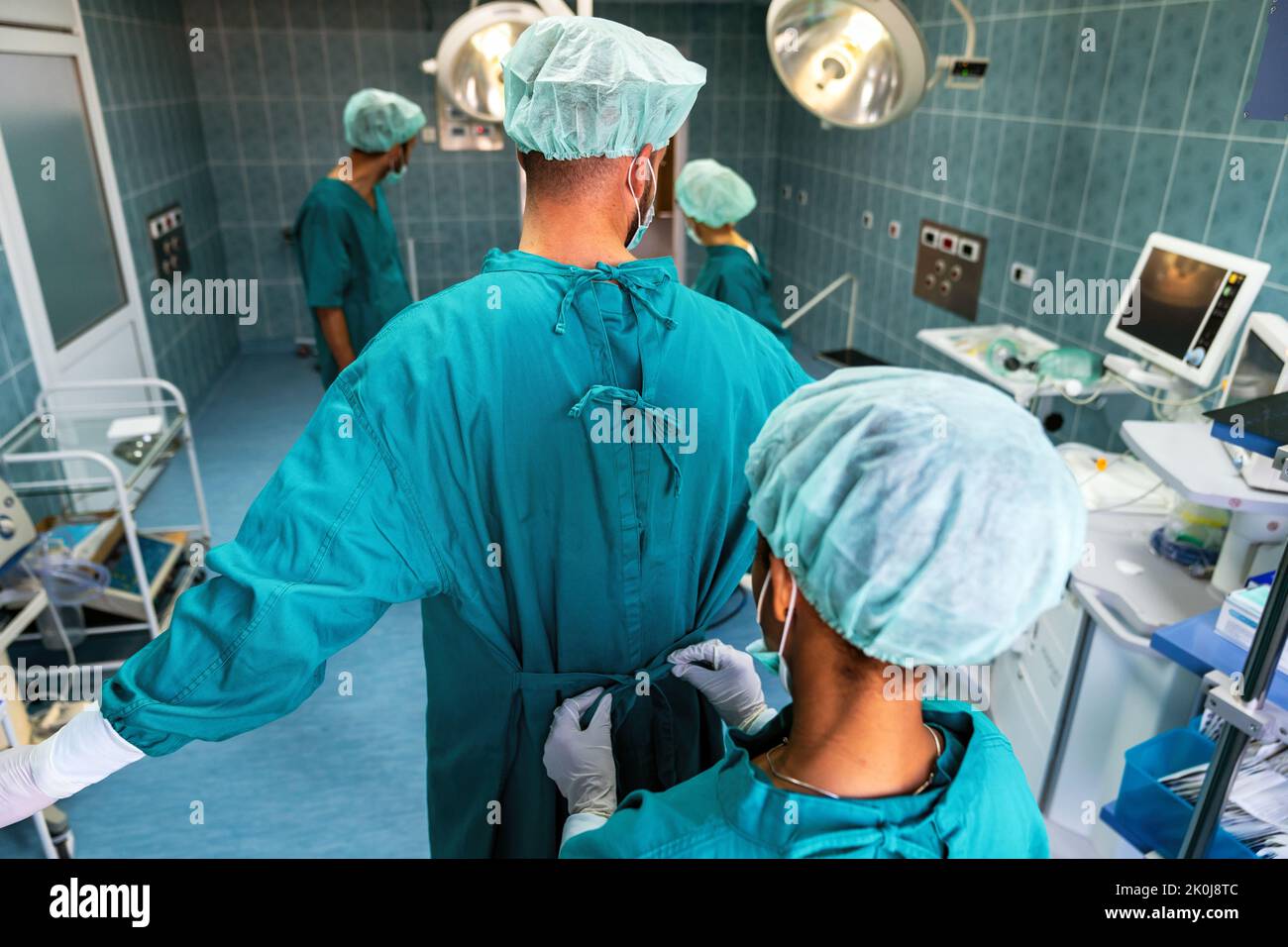 Team of surgeons in the operating room preparing for surgery Stock ...