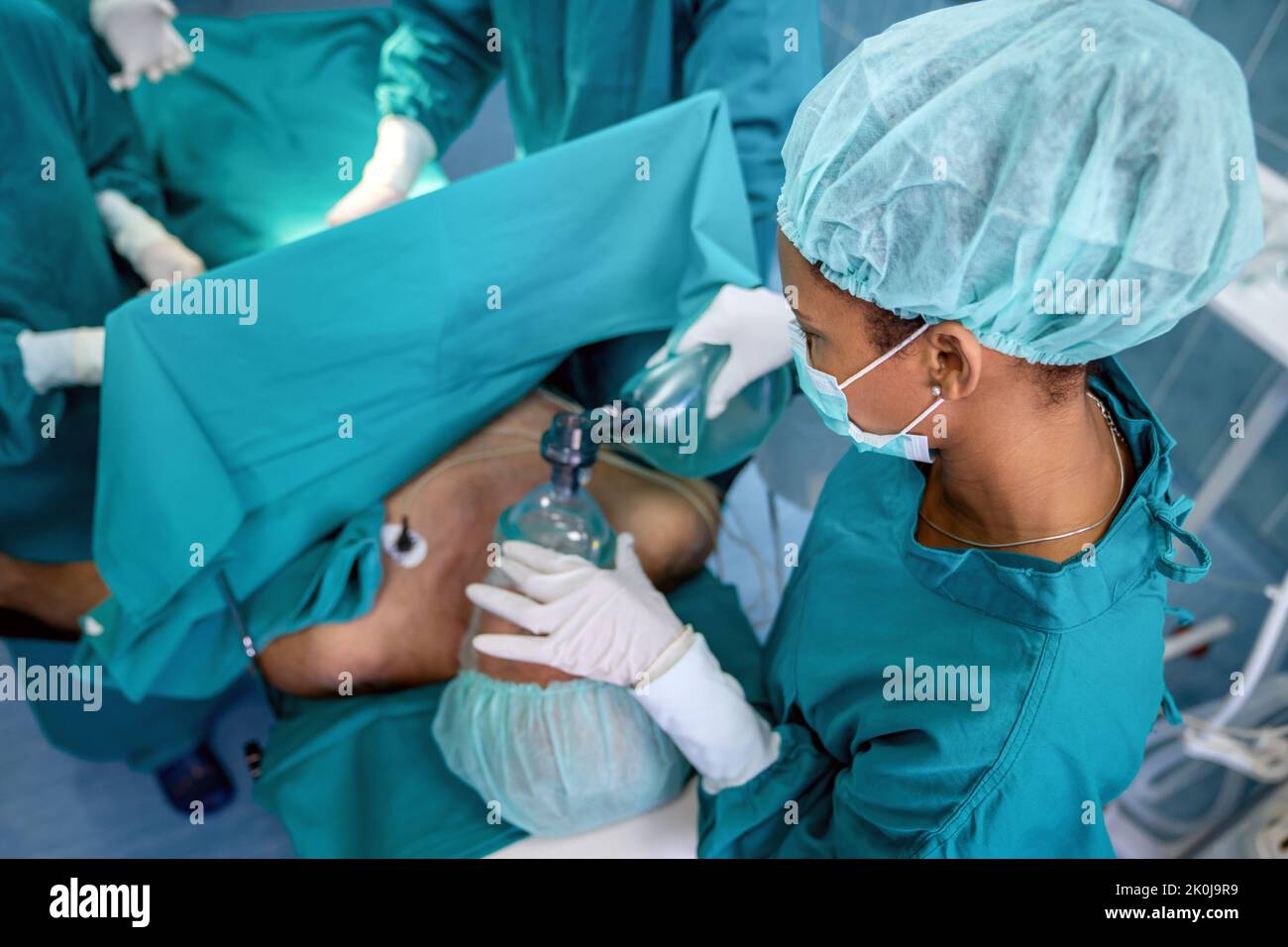 Anesthesiologist doctor anesthetized a surgical patient in hospital ...