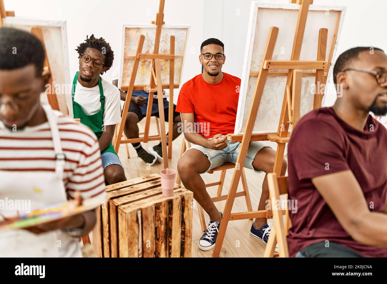 Group of young african american artist man smiling happy drawing at art ...