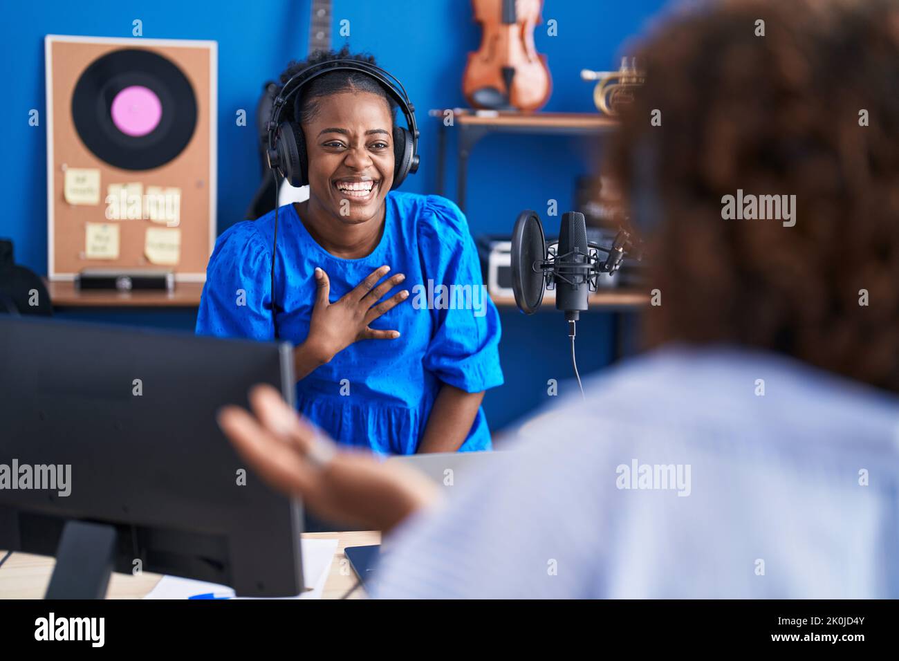African american women musicians smiling confident speaking at music ...