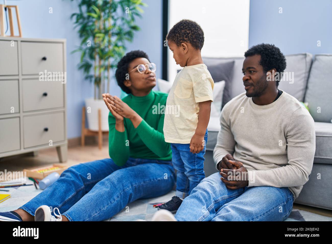 African american family speaking at home Stock Photo - Alamy
