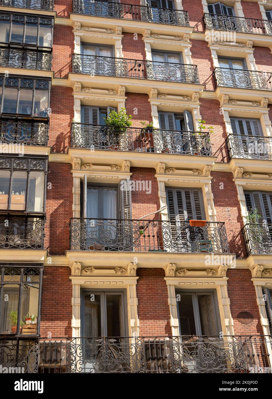 Typical windows and balconies in the Spanish city of Madrid under the ...