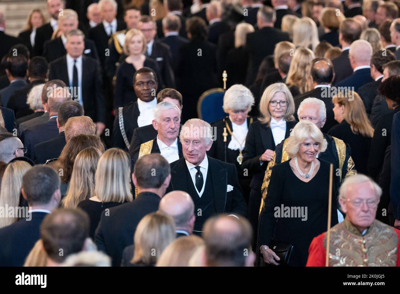 King Charles III and the Queen Consort process out of Westminster Hall ...