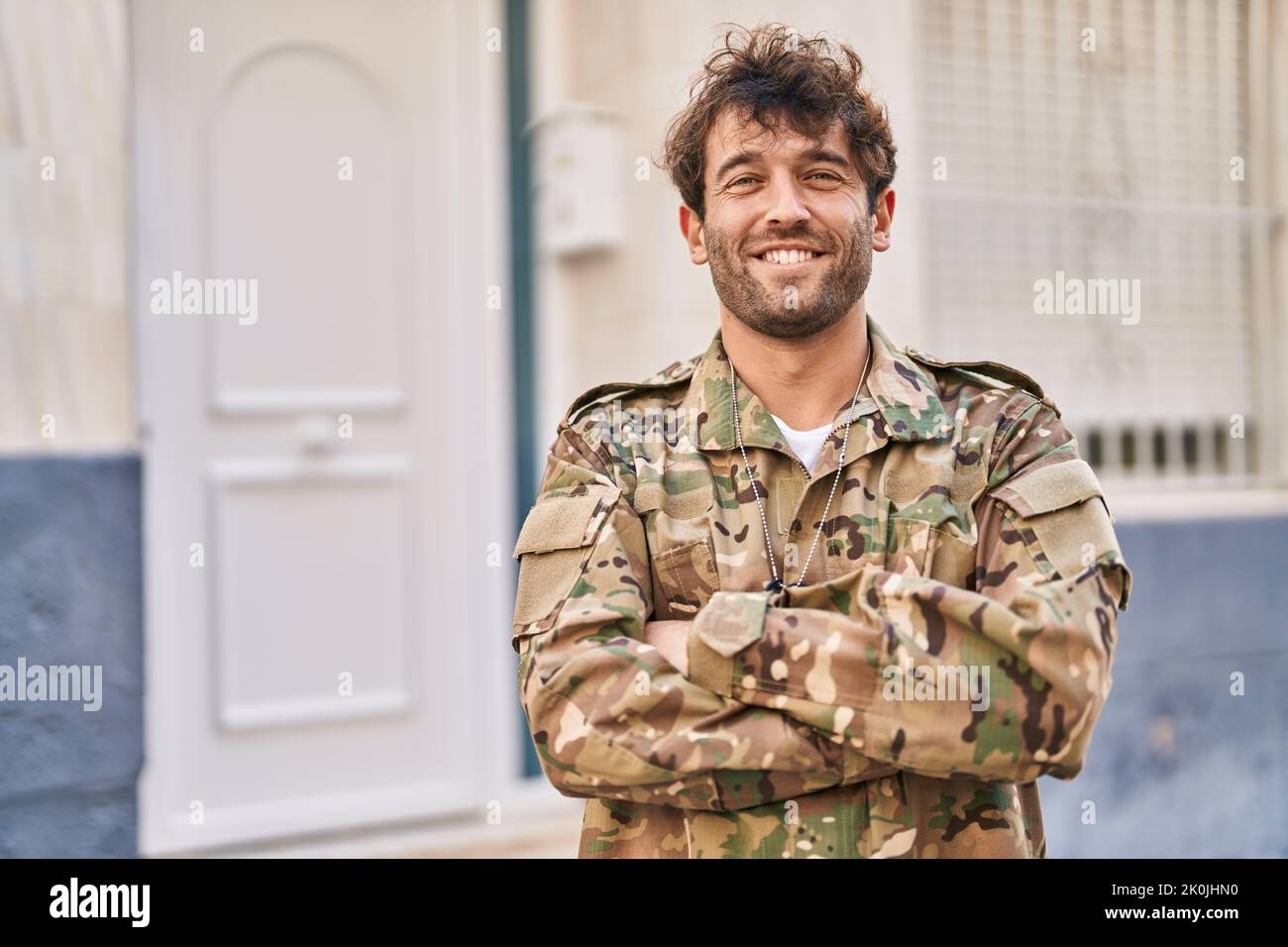 Young man army soldier smiling confident standing with arms crossed ...