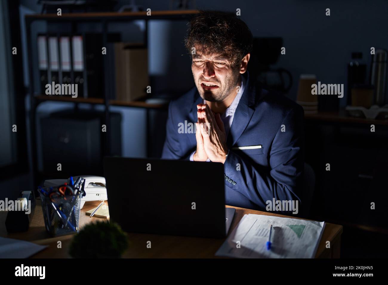Business man at desk begging hi-res stock photography and images - Alamy