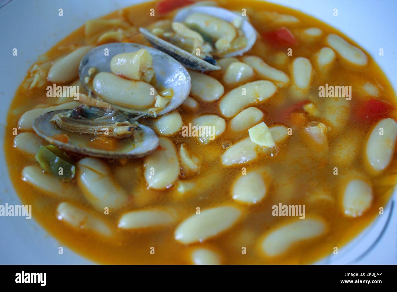 beans with clams is a typical dish in Galicia Stock Photo - Alamy