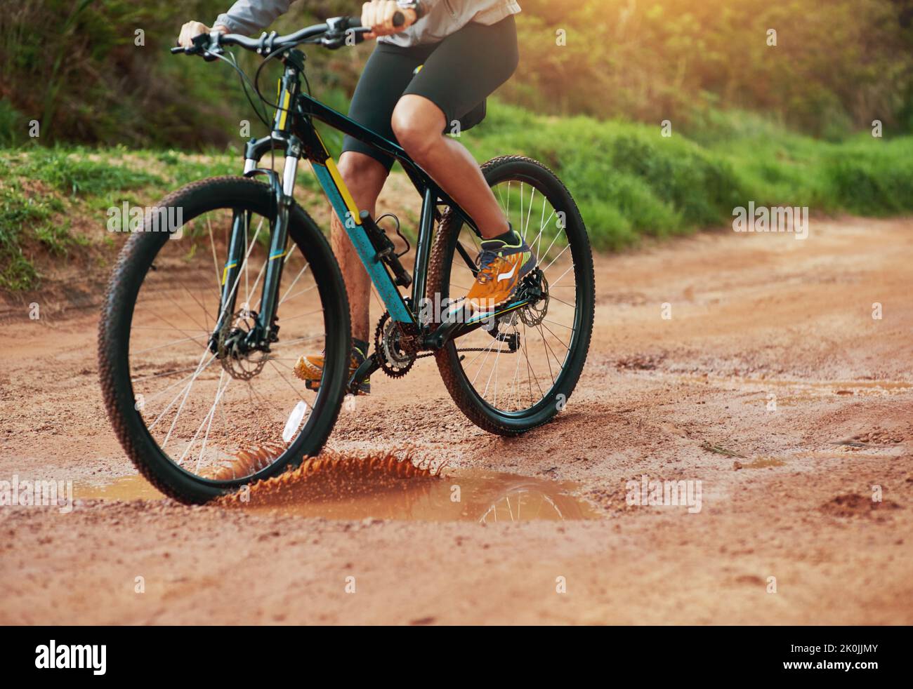 Cycling The perfect cardio. a young woman mountain biking in a scenic ...