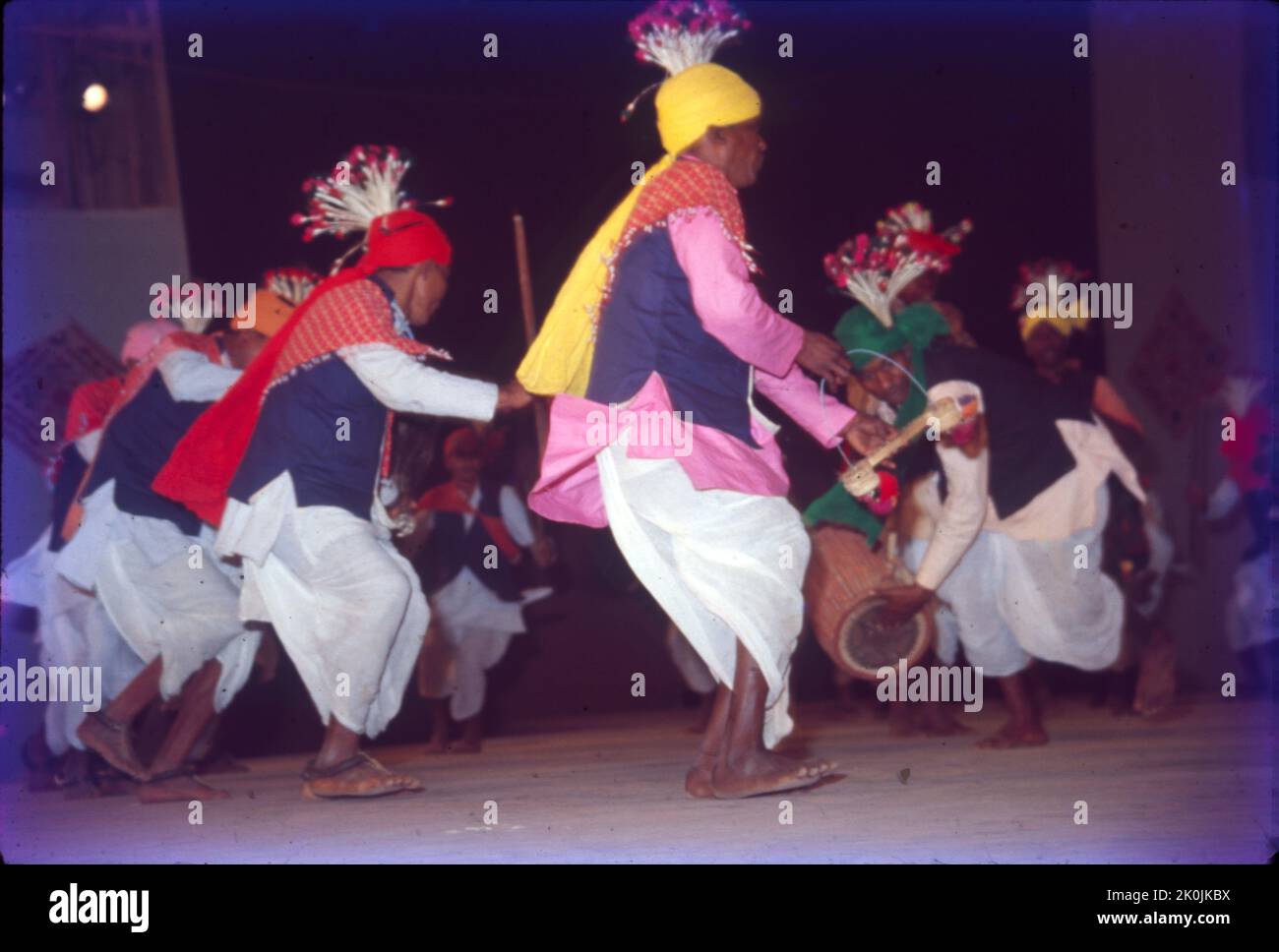 Tribals with sticks in hand hi-res stock photography and images - Alamy