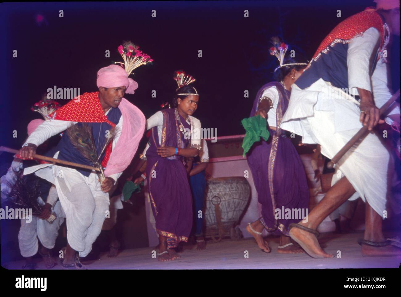 Tribals with sticks in hand hi-res stock photography and images - Alamy