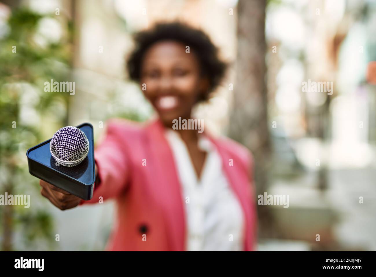 African woman interview outside hi-res stock photography and images - Alamy