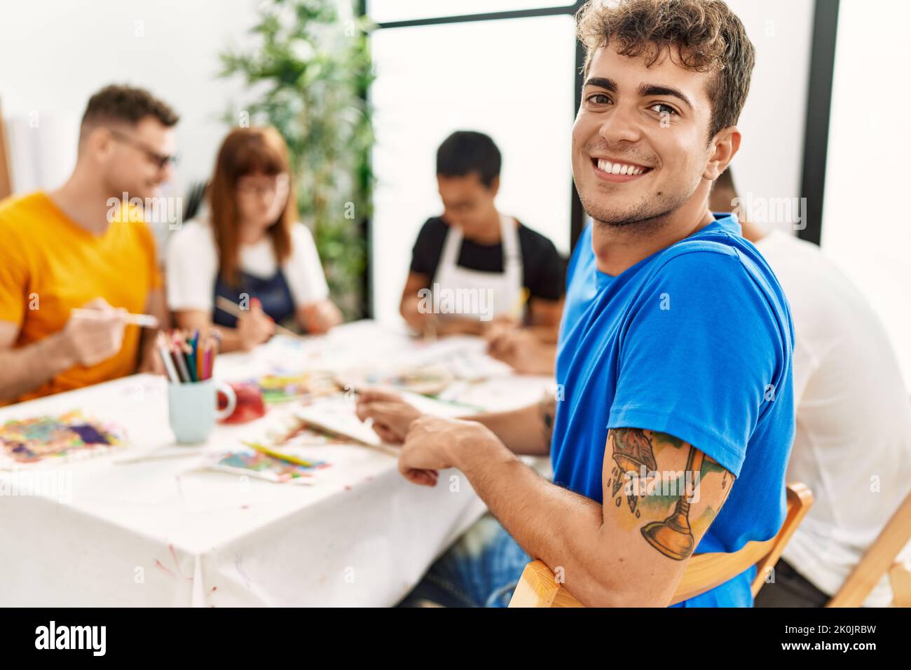 Group of people drawing at art studio Stock Photo - Alamy