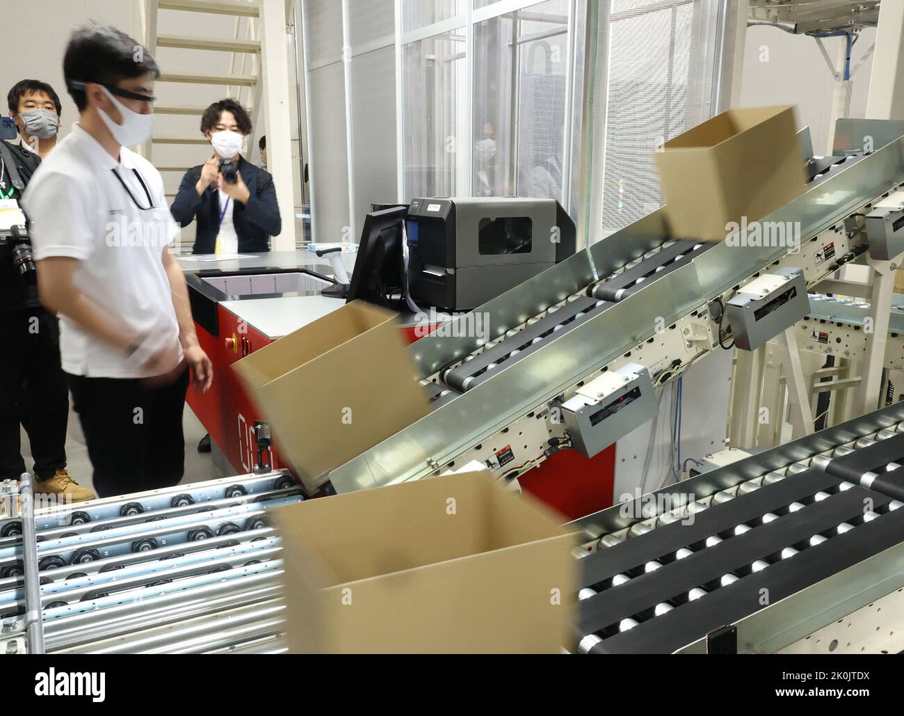 Ichikawa, Japan. 12th Sep, 2022. Japan's Softbank Robotics displays a logistics solution with ...