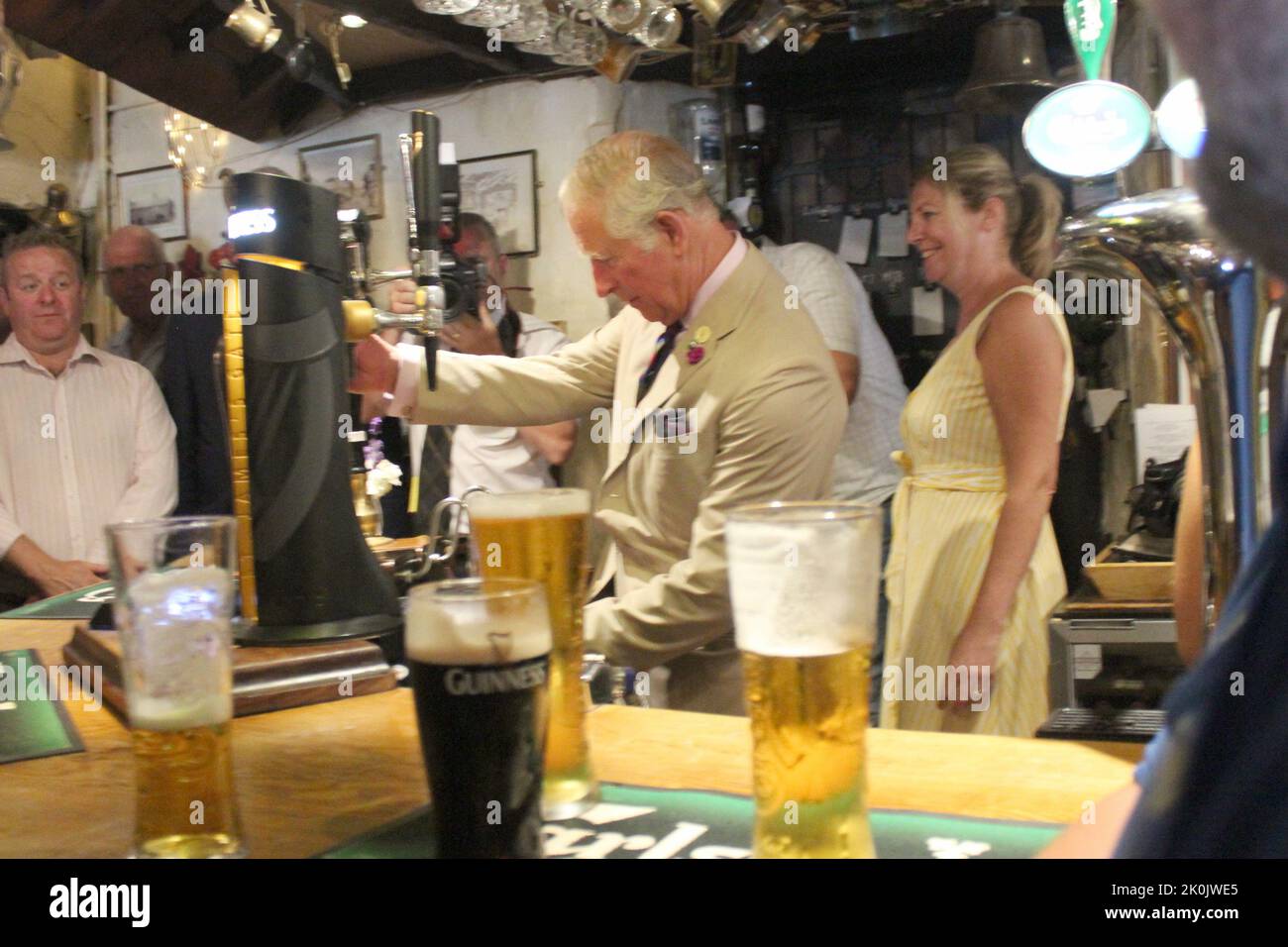 Charles the Prince of Wales visits North Wales and calls in a local pub ...