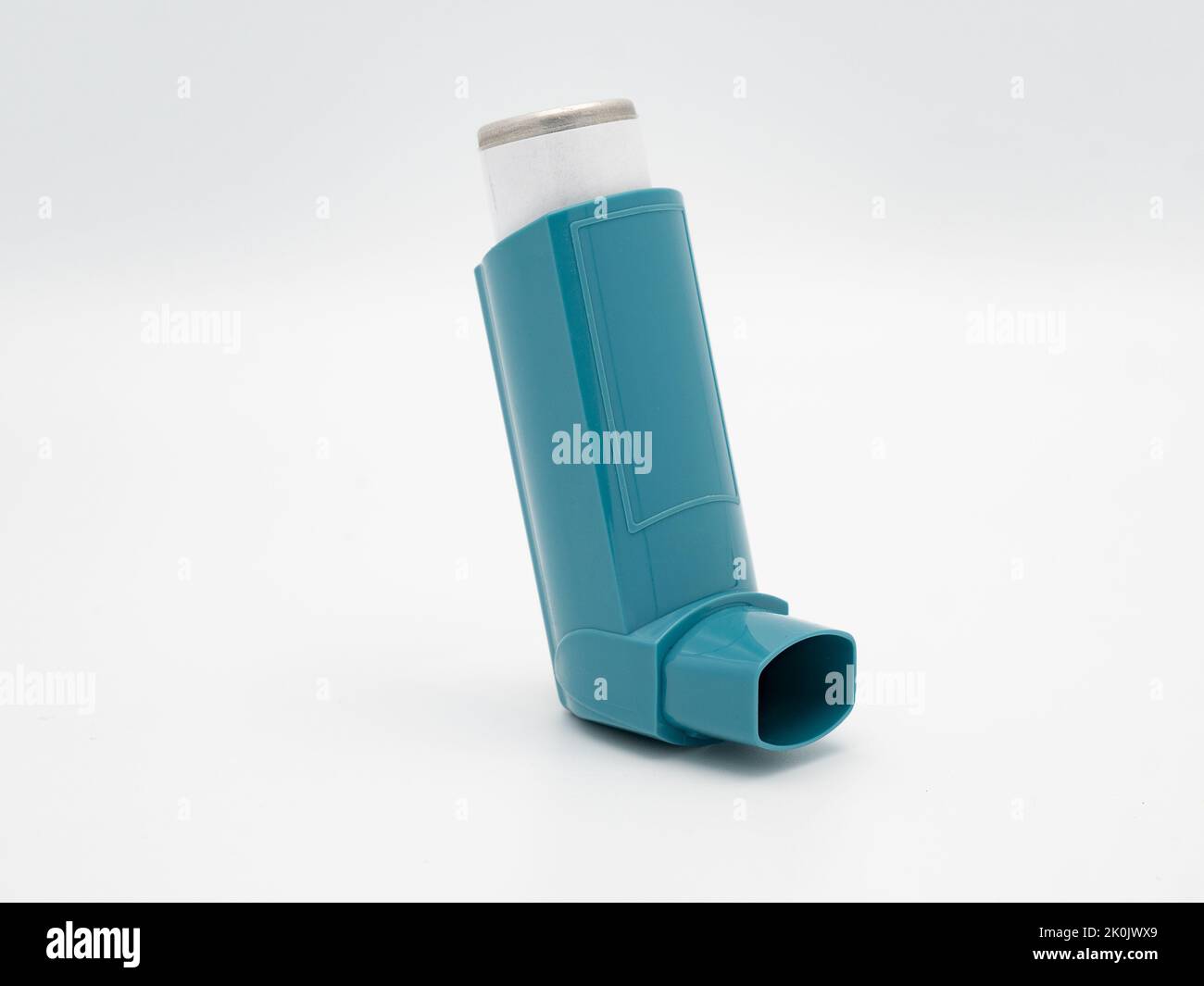 An asthma inhaler isolated on a white background Stock Photo - Alamy