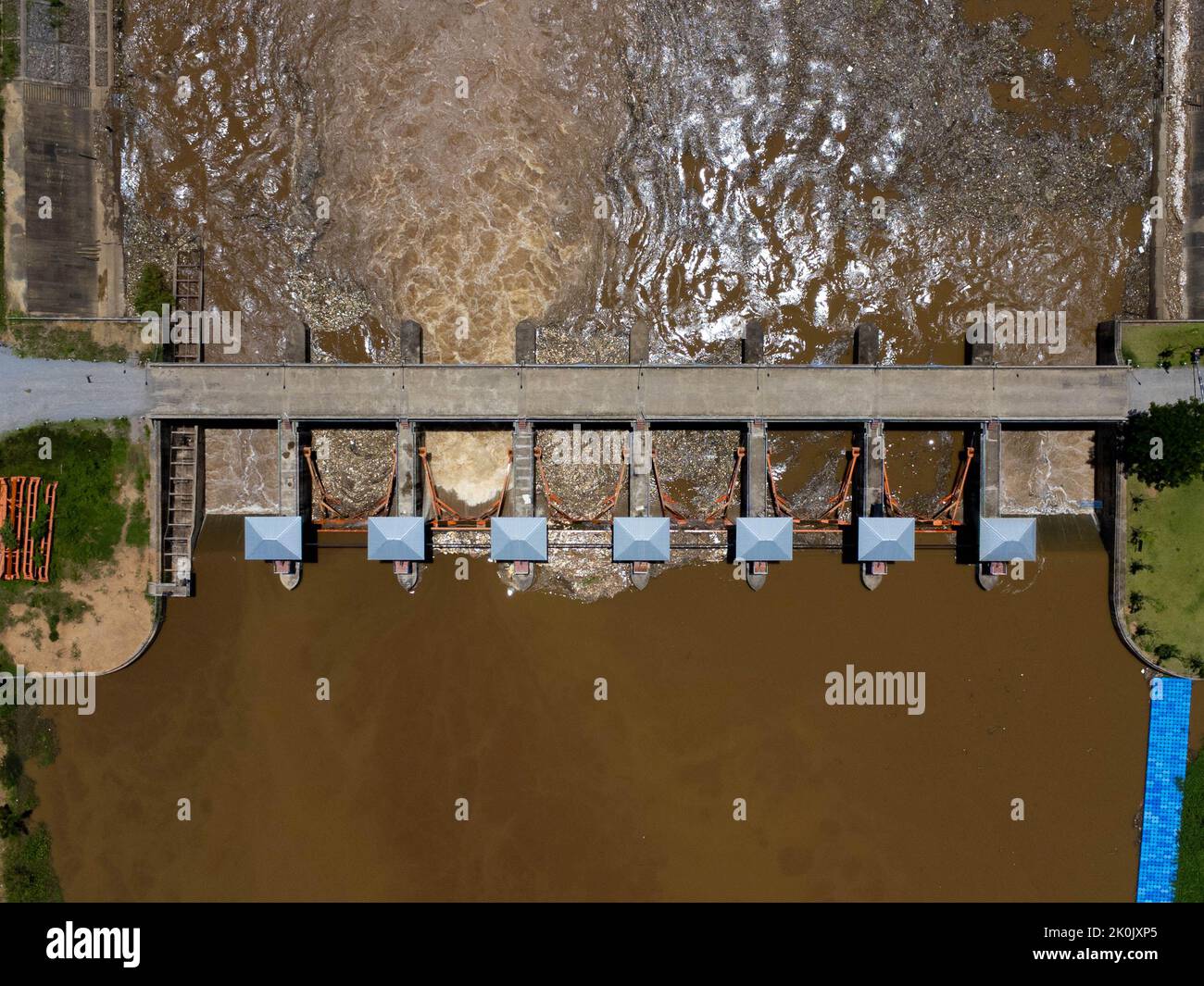 Aerial view of the water released from the concrete dam's drainage ...