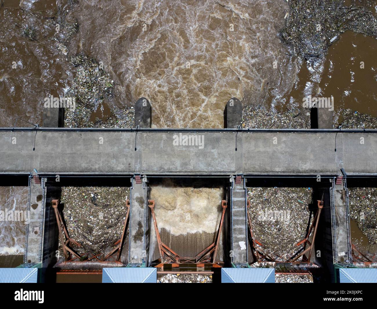 Aerial view of the water released from the concrete dam's drainage ...