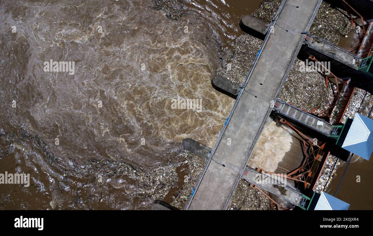 Aerial view of the water released from the concrete dam's drainage ...
