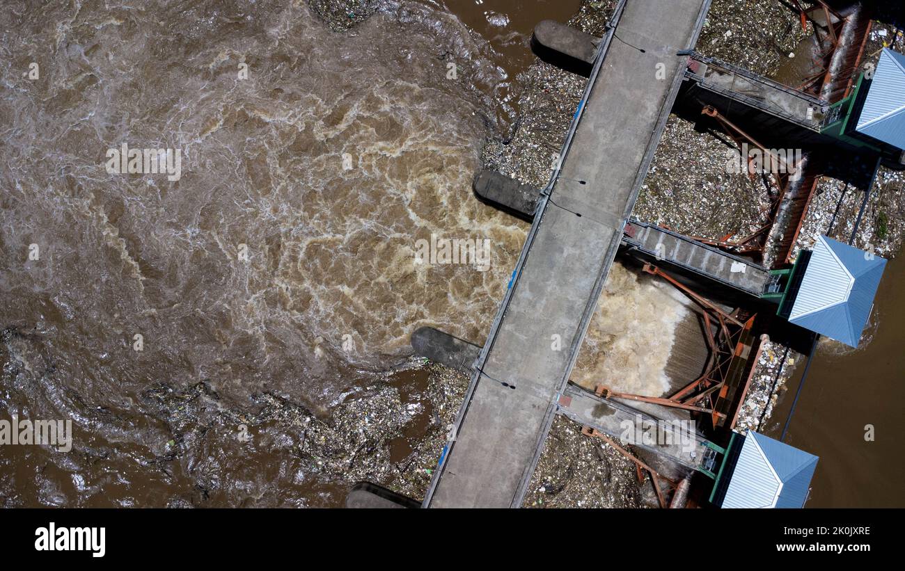 Aerial view of the water released from the concrete dam's drainage ...