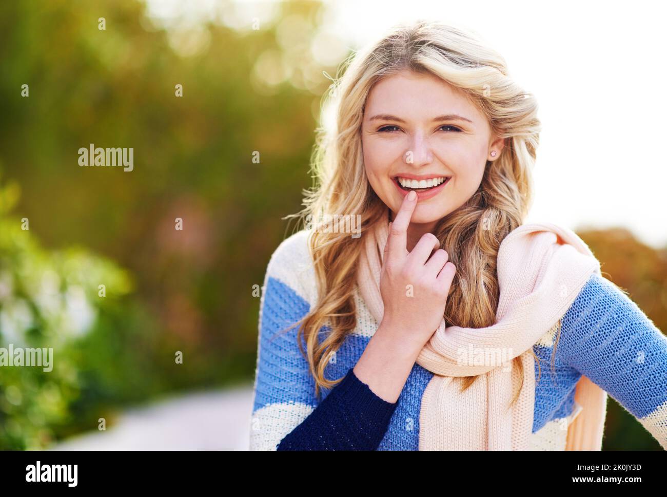 I like you...youre funny. Cropped portrait of a young woman laughing ...