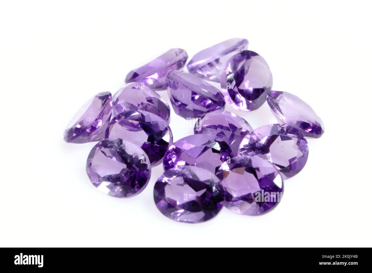 Natural gemstone purple amethyst on background Stock Photo - Alamy