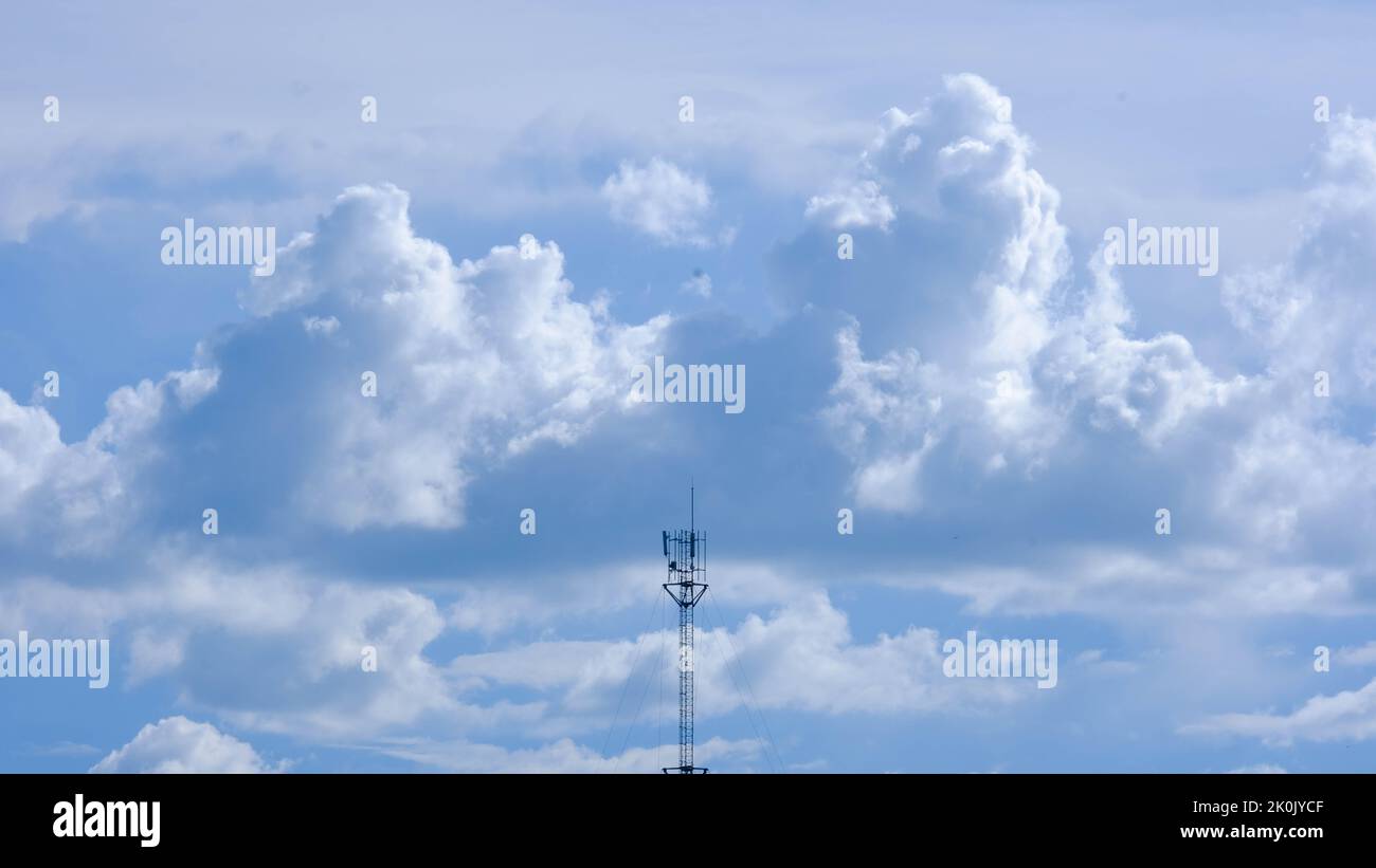 Aerial view of the antenna on the sky background. Technology and ...