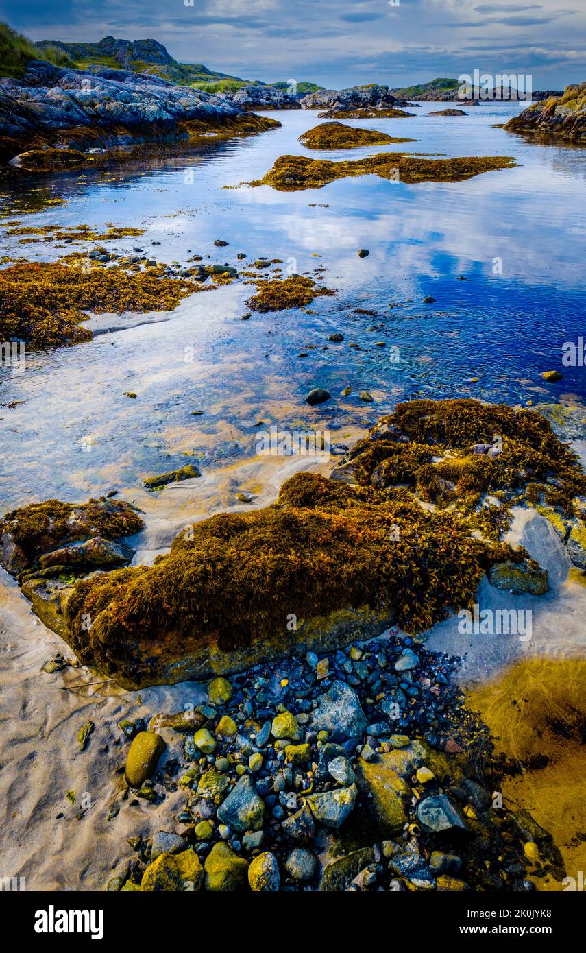 Seascape at Red Rocks beach, Isle of Coll Scotland Stock Photo - Alamy