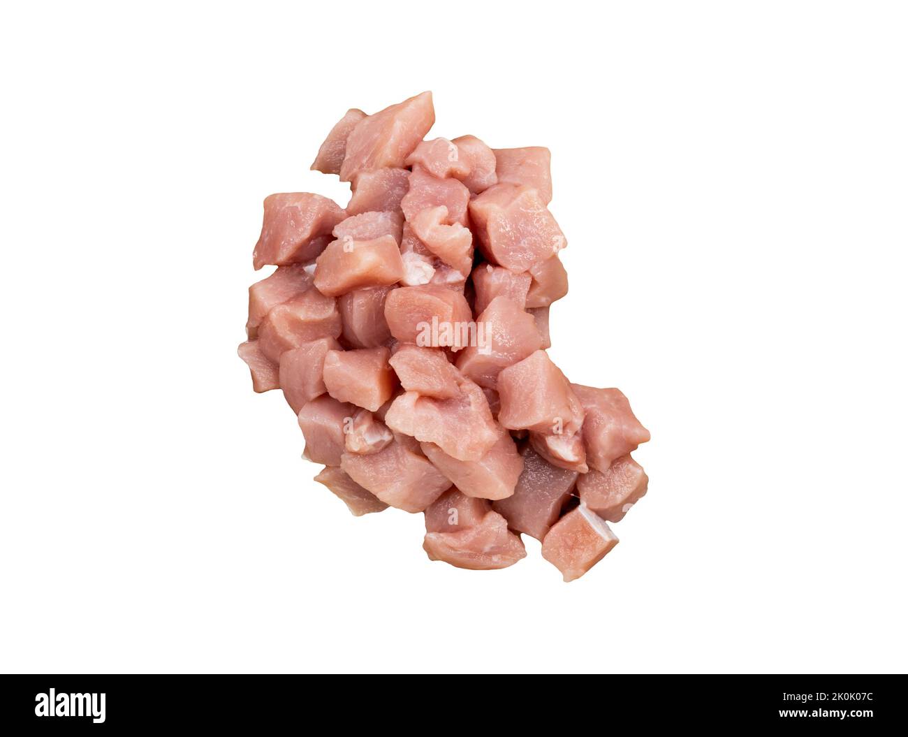 Top view a pile of cube-cut fresh pork on white background. Isolated a ...