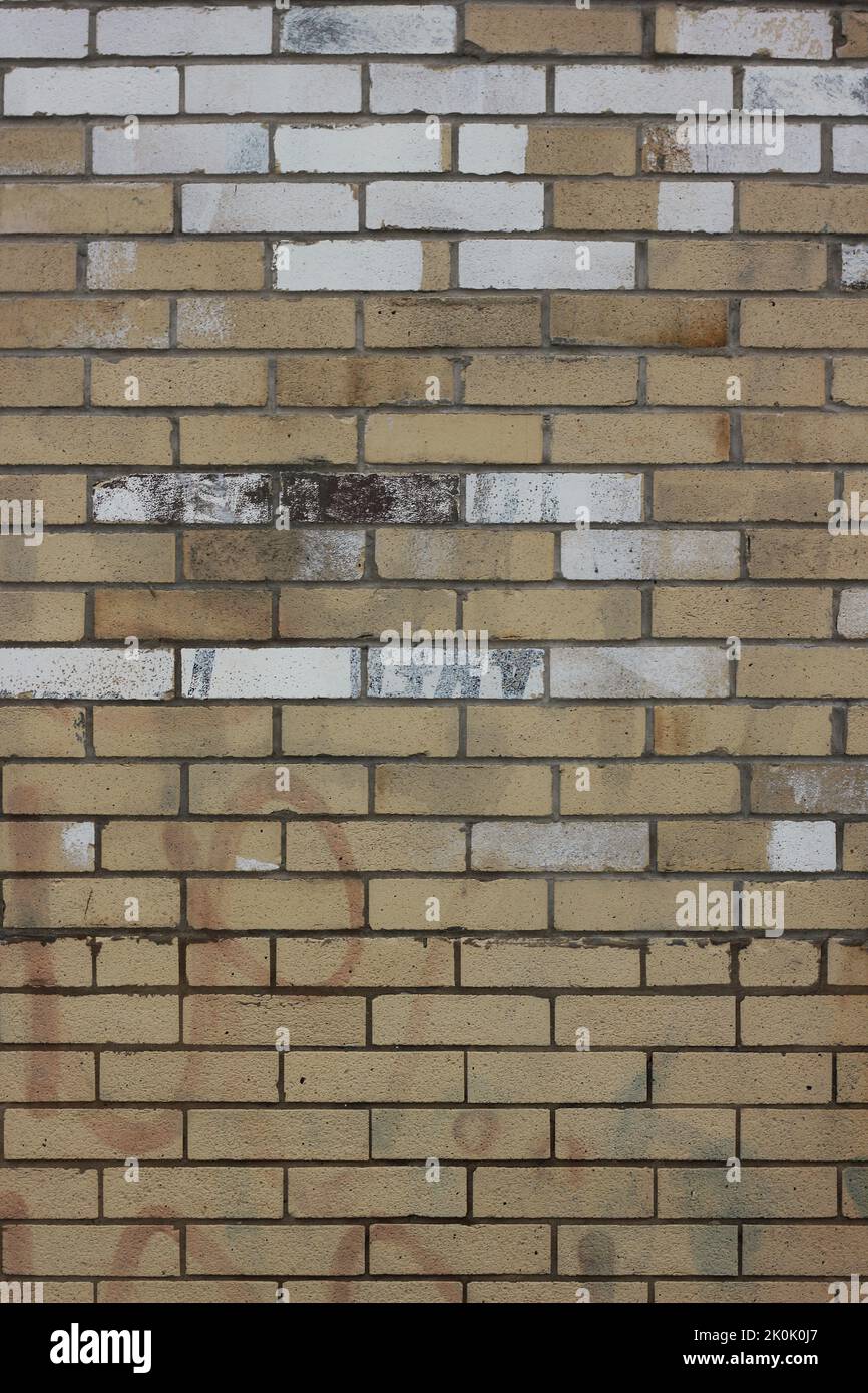 Typical common weathered brick wall Stock Photo - Alamy