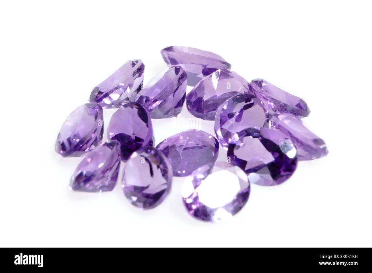 Natural gemstone purple amethyst on background Stock Photo - Alamy