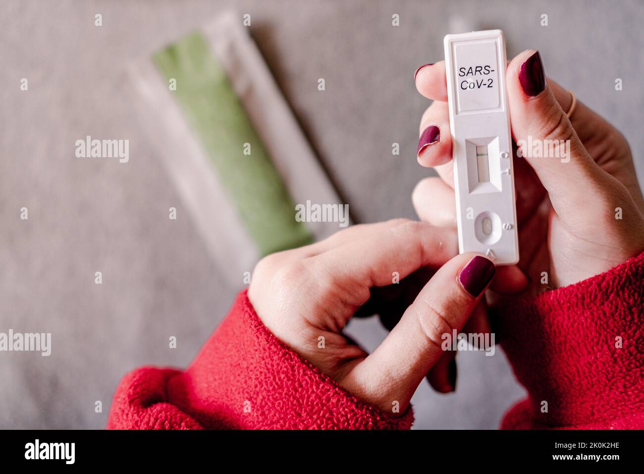 Crop unrecognizable female with manicure demonstrating modern rapid ...