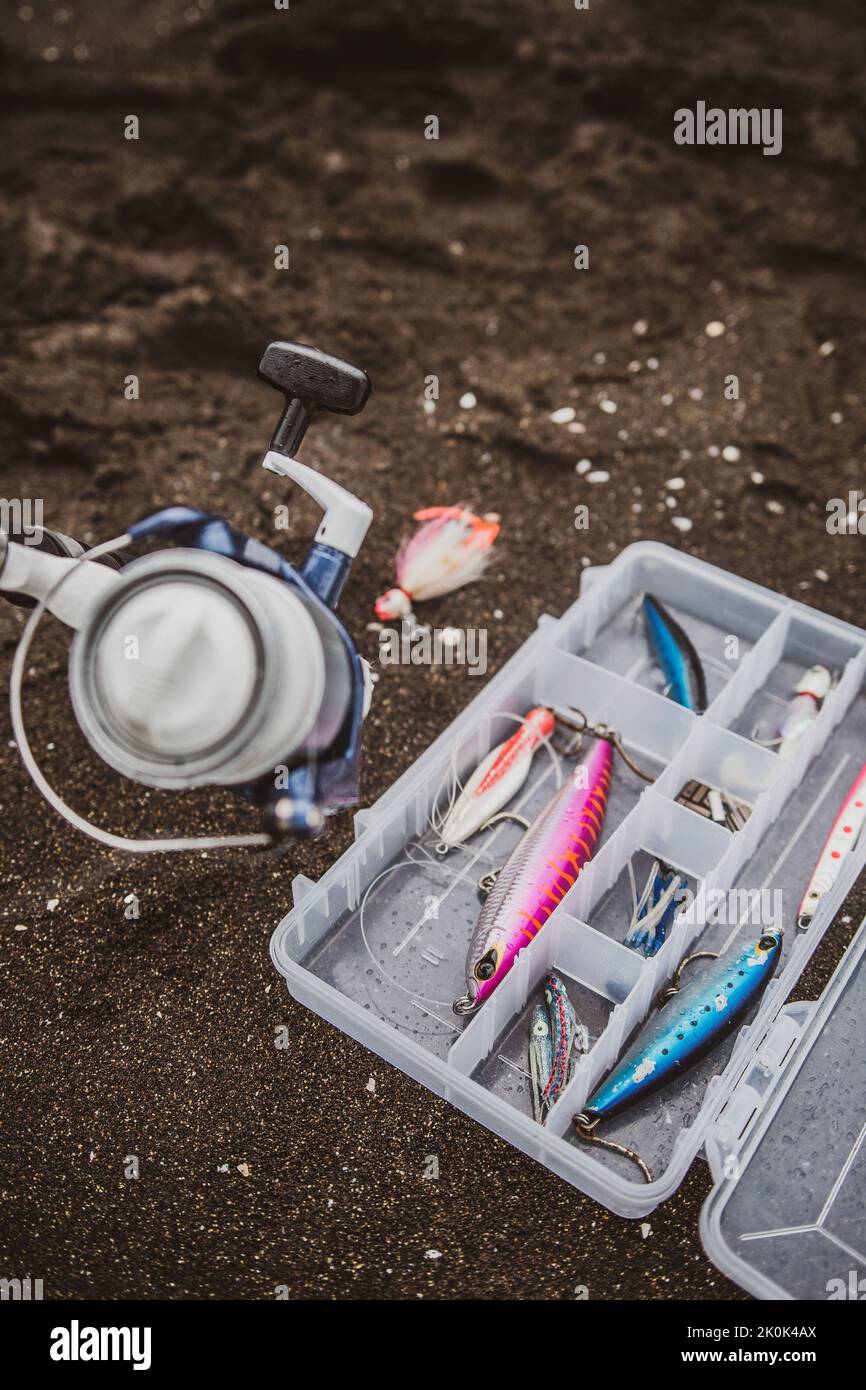 From above plastic container filled with various types of fishing boats ...