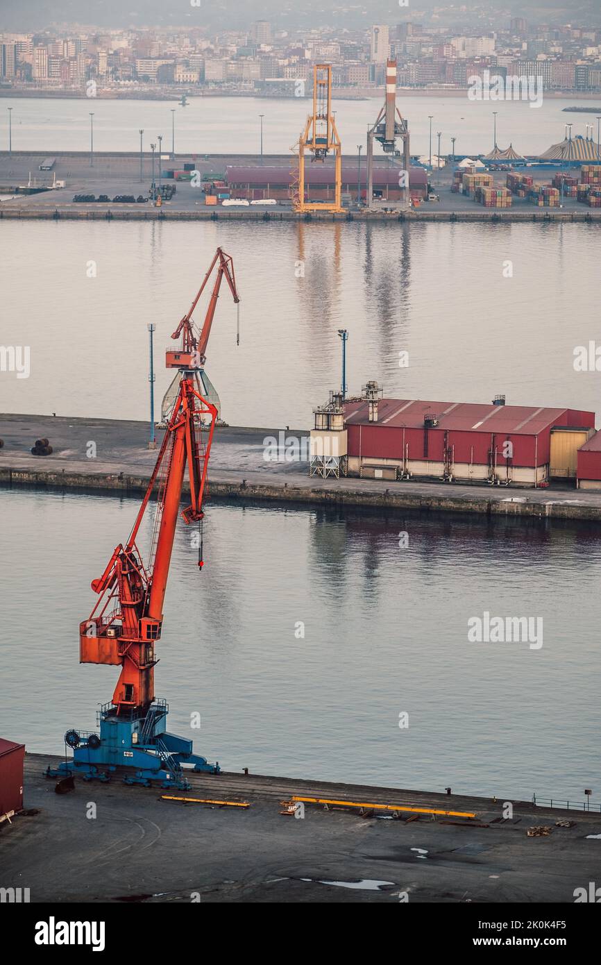 Aerial view of industrial coal extraction with working machines and ...