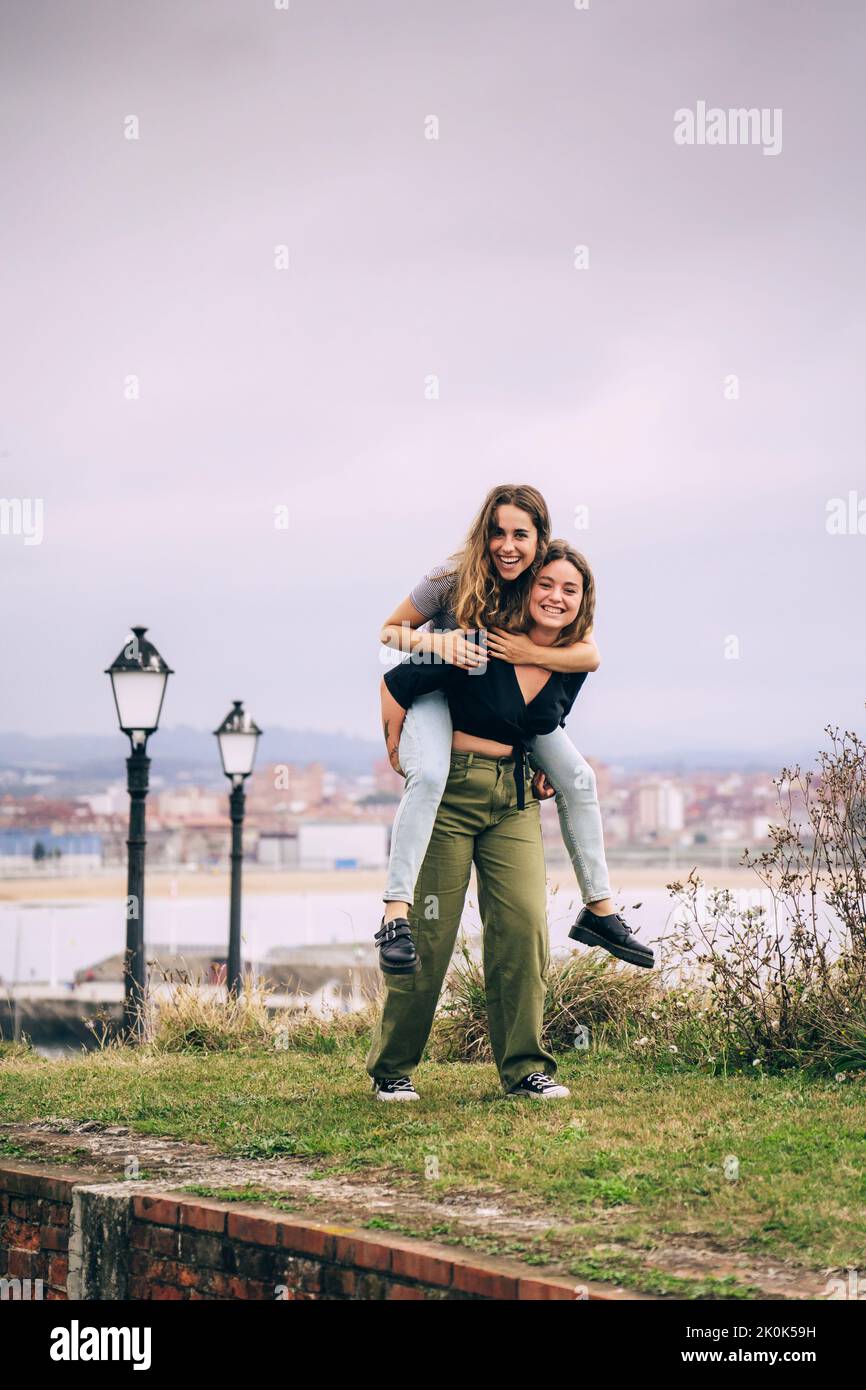 Girls enjoying a nice day in the park Stock Photo - Alamy