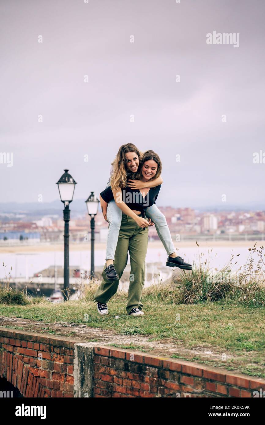 Girls enjoying a nice day in the park Stock Photo - Alamy