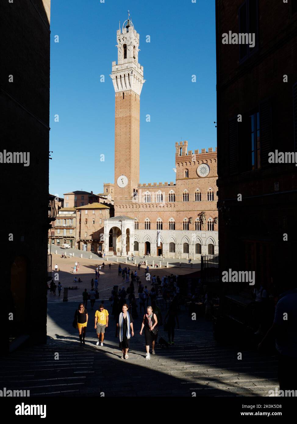 Siena, Tuscany, Italy. Looking through to Il Campo, a medieval piazza ...