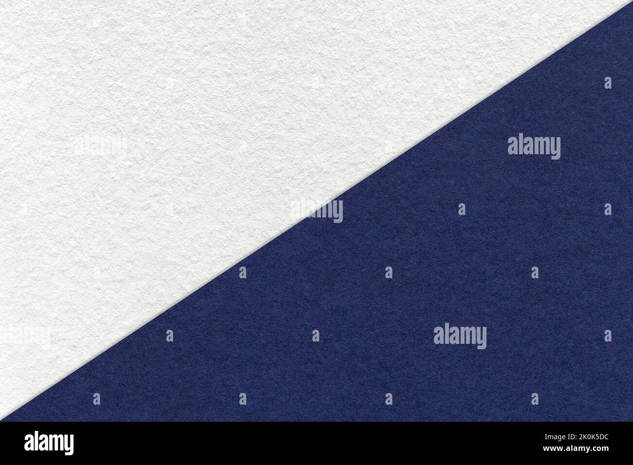 Texture of craft white and navy blue paper background, half two colors ...