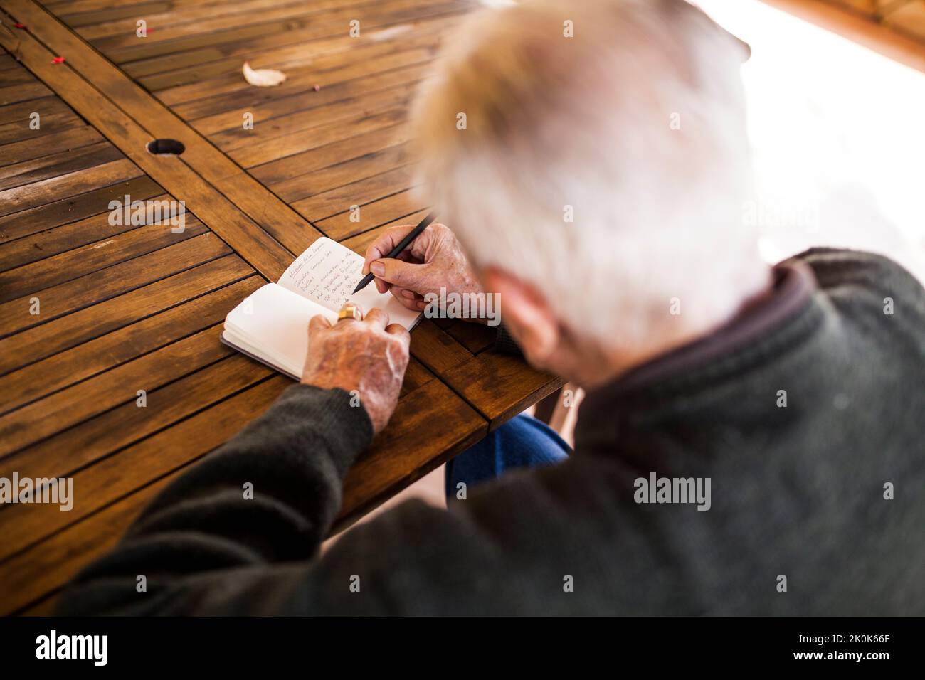 Pensive old man on couch hi-res stock photography and images - Alamy