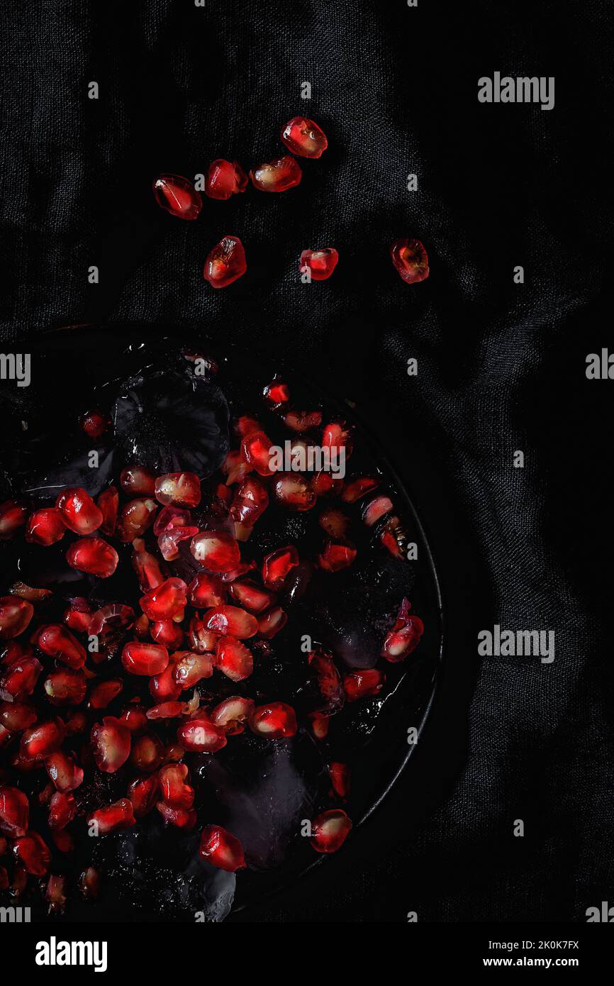 Fresh and red pomegranate on dark background. Fall season fruit. Top ...