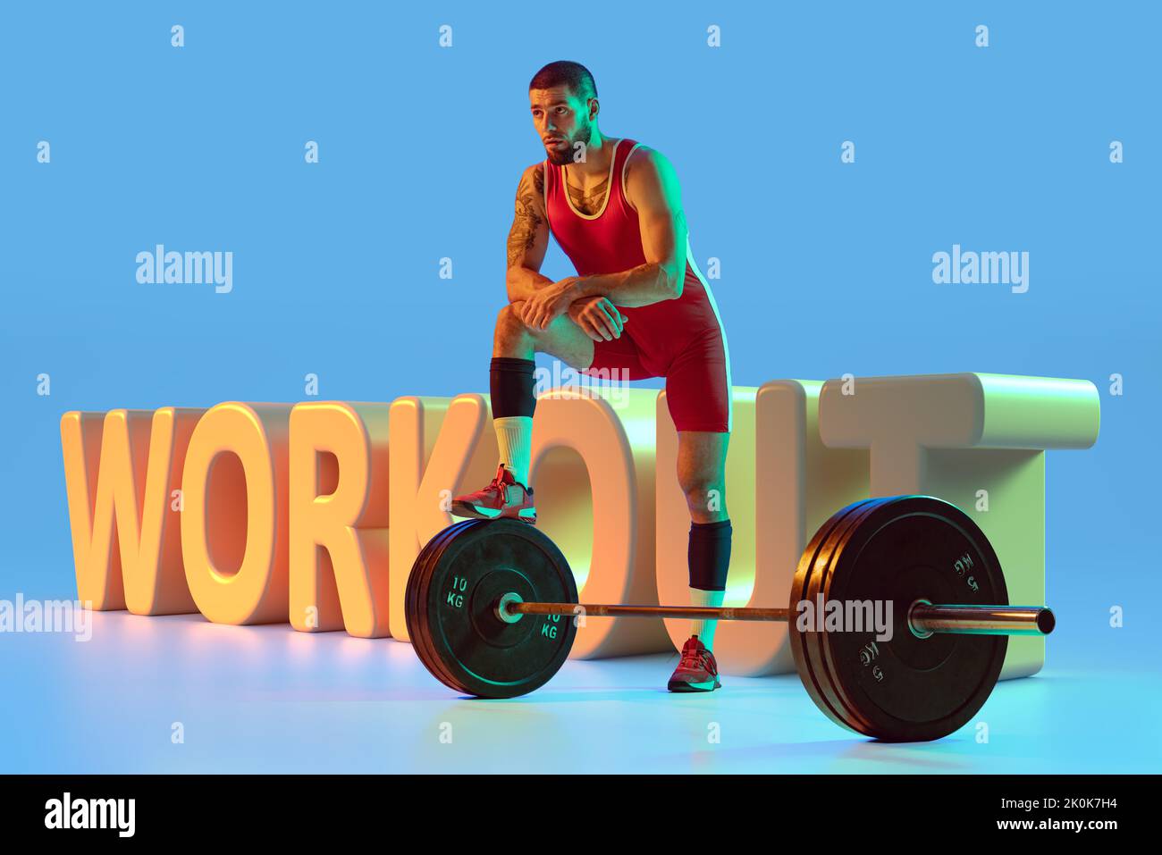 Workout. Young muscular athlete posing with 10kg barbell over huge 3d ...