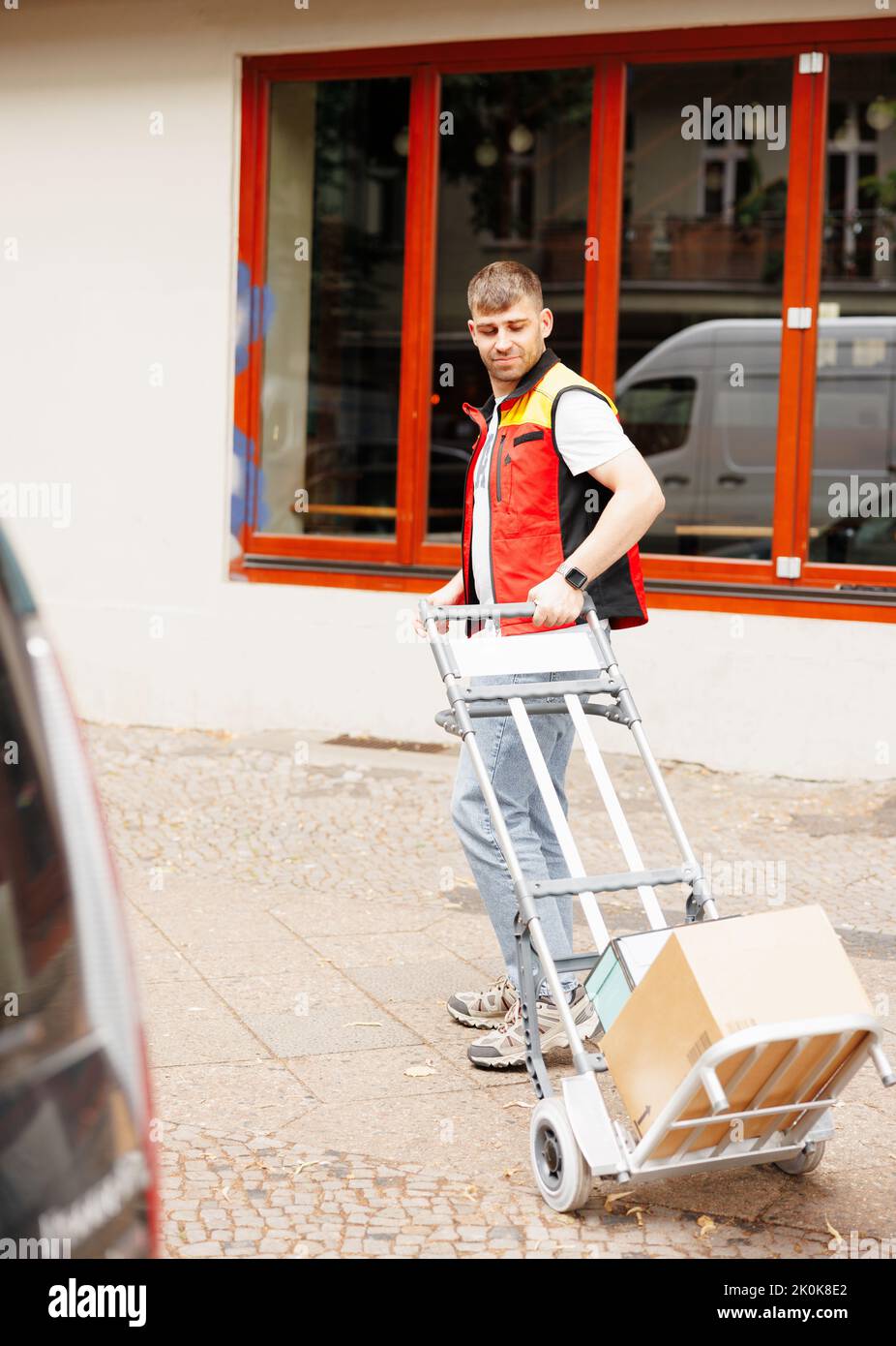 A man is ready to deliver, he goes to the place of delivery Stock Photo ...