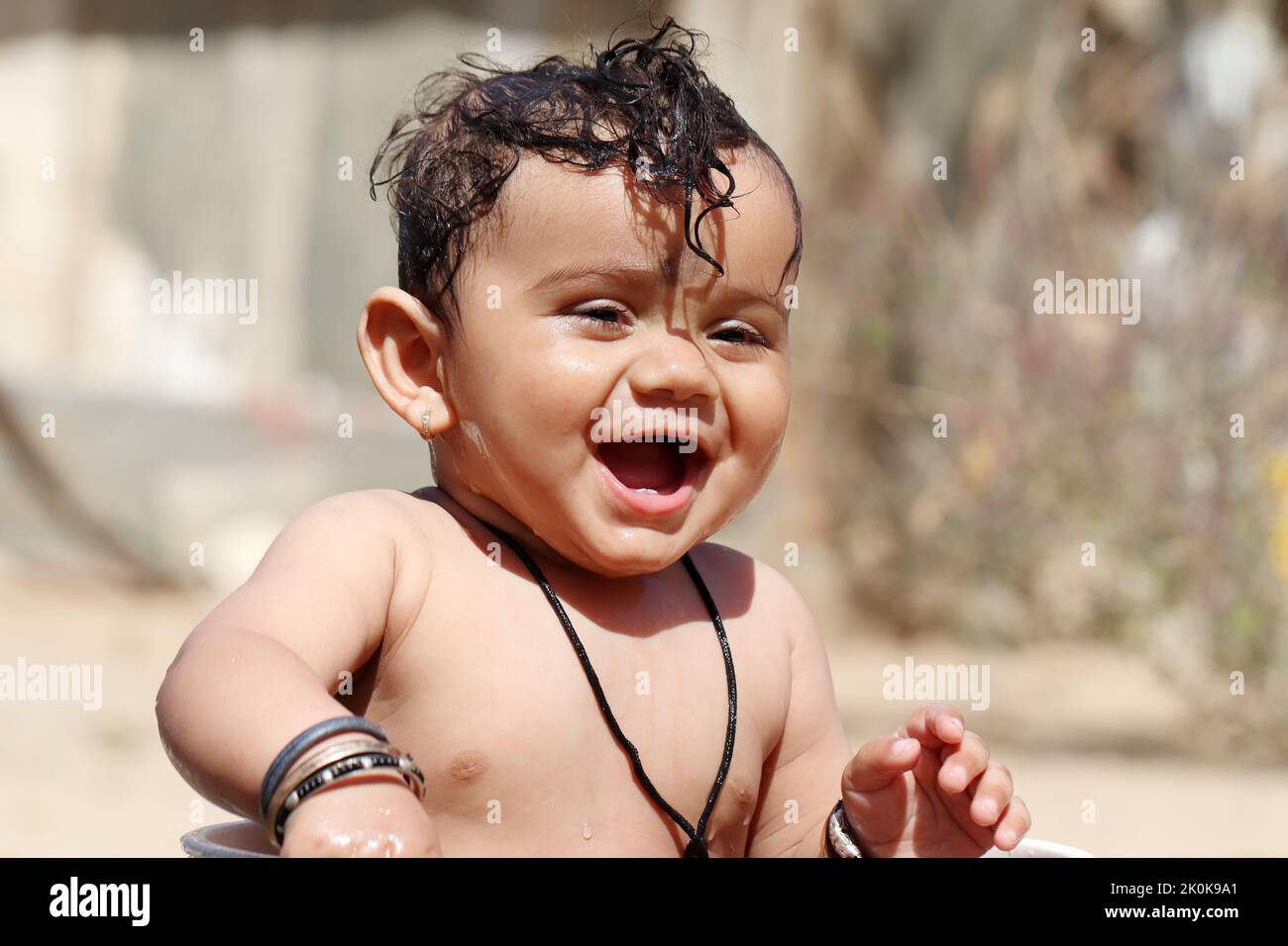 Portrait of smiling face Adorable baby boy with funny expression and ...