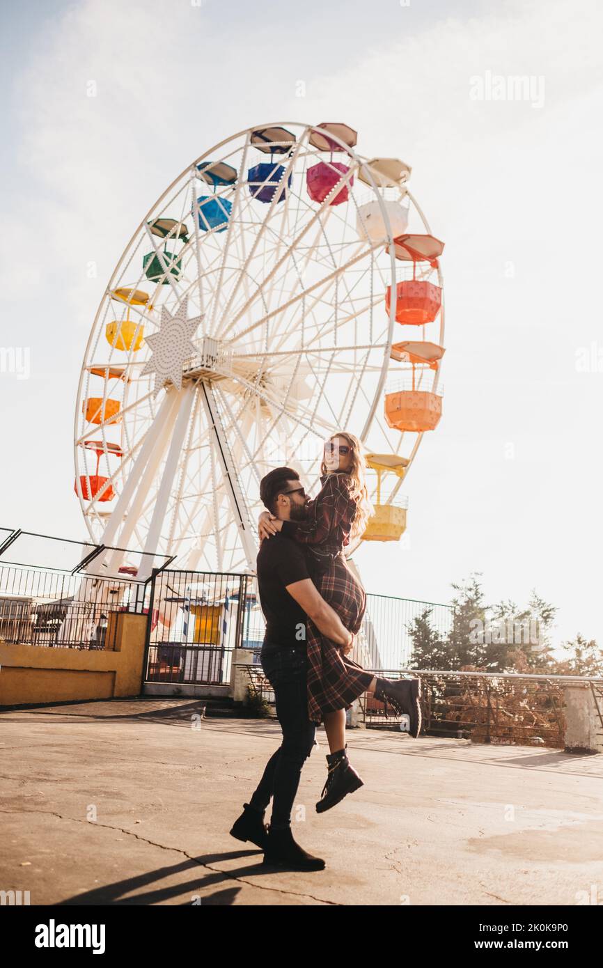 couple on a date in a funfair in Barcelona, Spain Stock Photo - Alamy