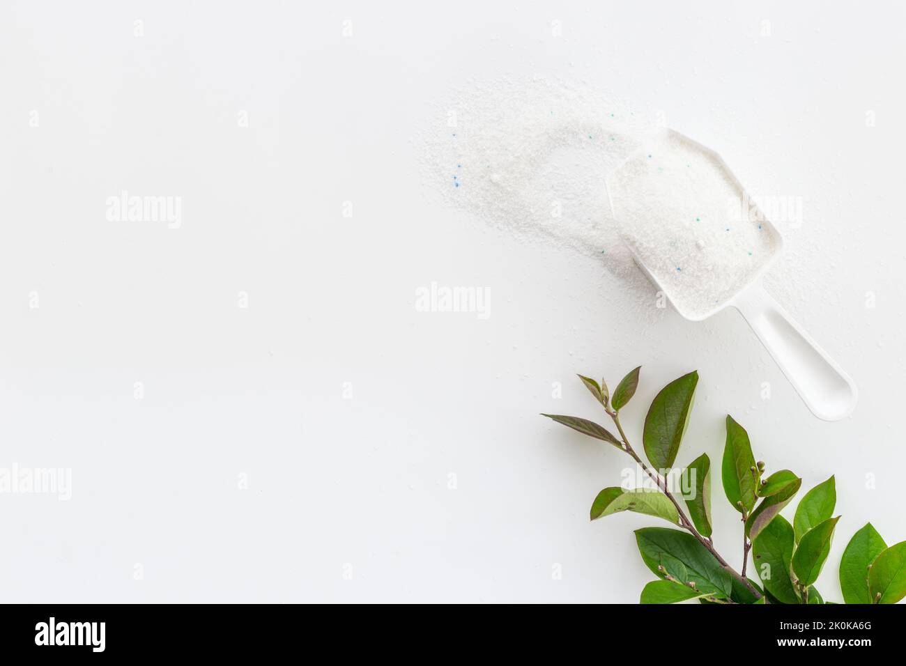 White washing powder with measuring cup. Laundry day concept Stock ...
