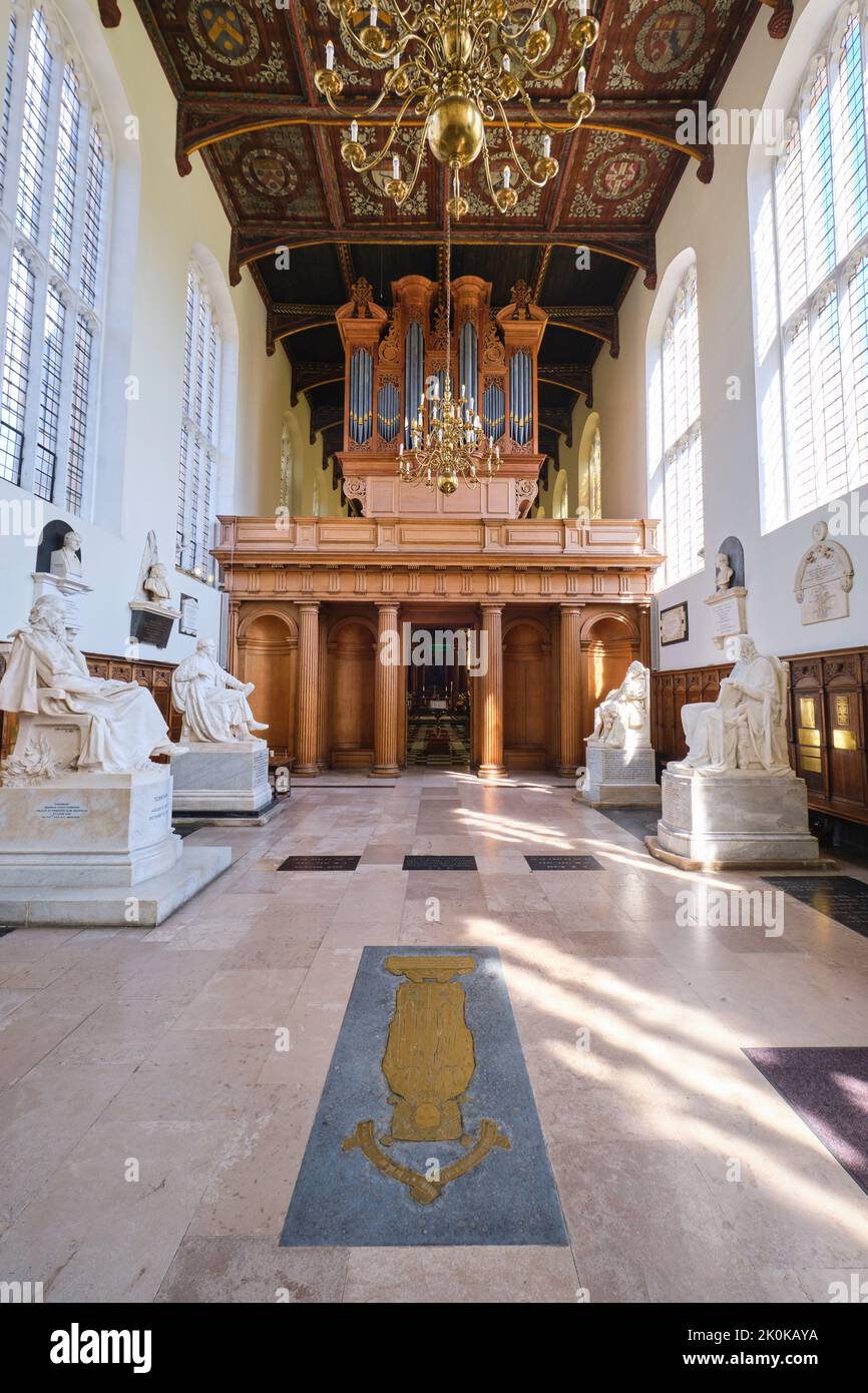 Interior view of the Trinity college chapel with marble statues of ...