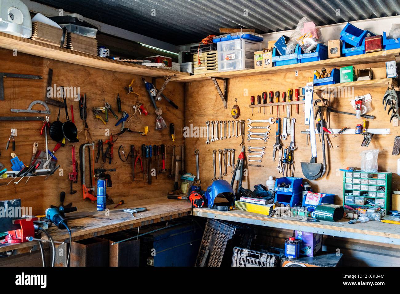 Wooden boards with various instruments and tools of joinery above ...